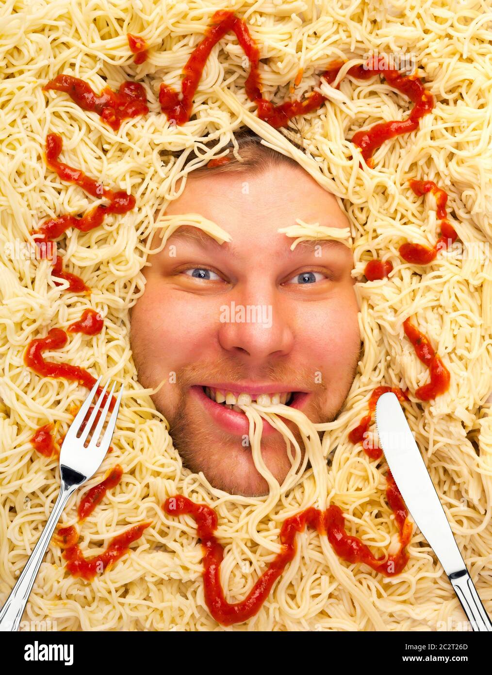 Happy man eating pasta, dinner time Stock Photo - Alamy Happy man eating pasta, dinner time Stock Photo - Alamy