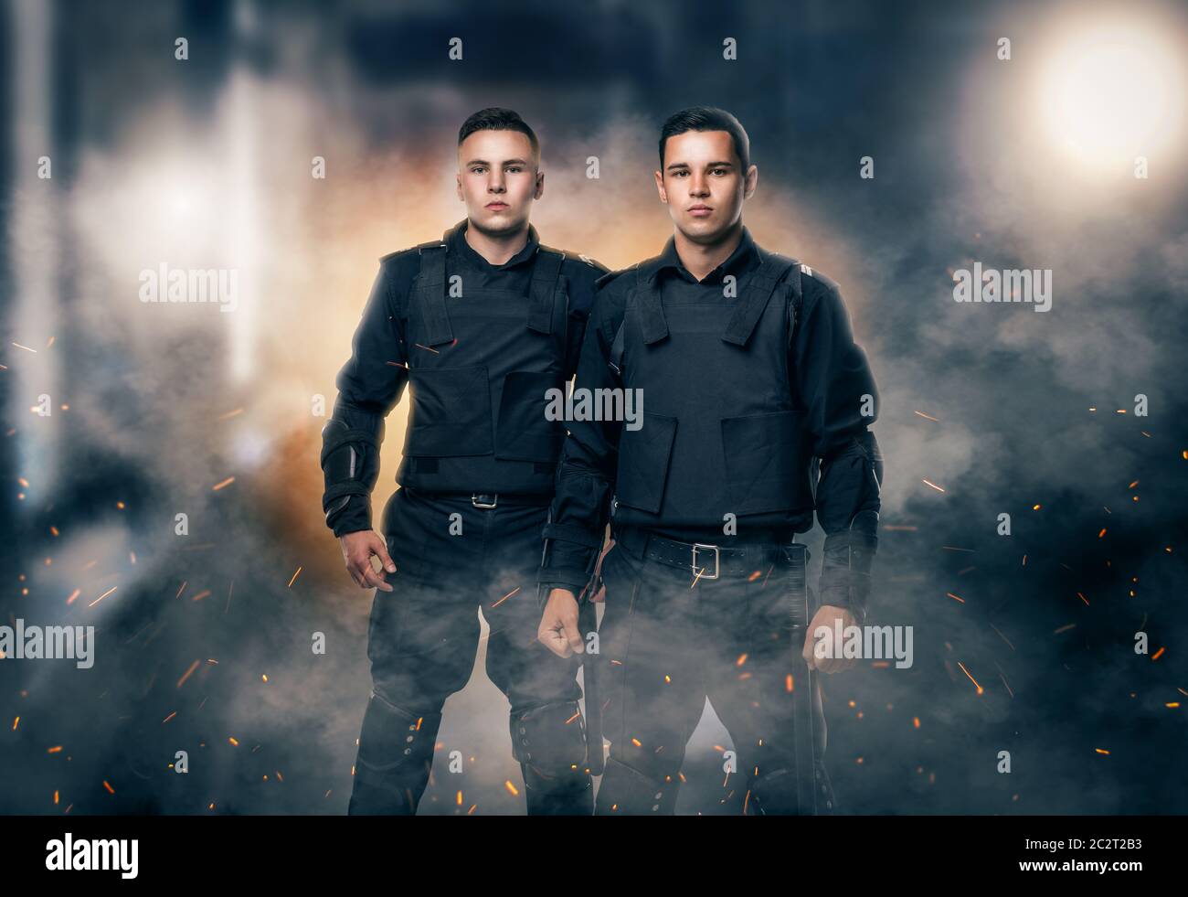 Cops in black uniform and body armor. Two police officers in special ...