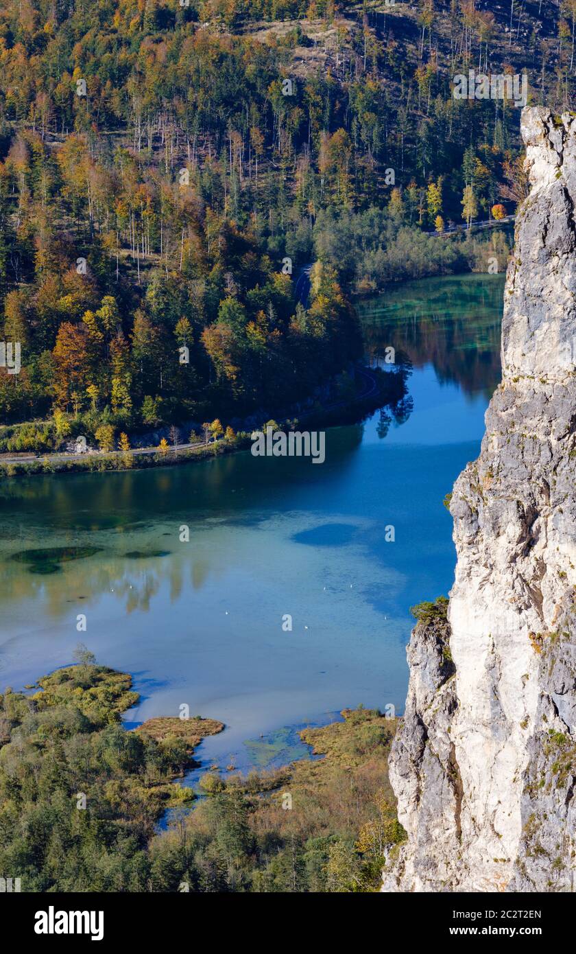View from up to autumn Alps mountain lake with clear transparent water ...