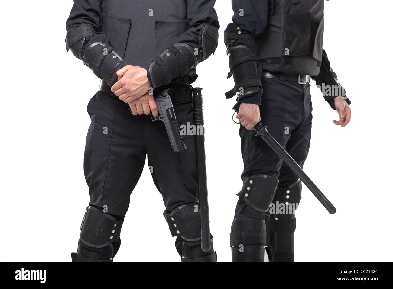 Police with a gun and a baton in black uniform and body armor on white ...