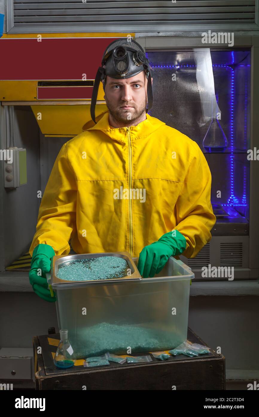 Man in protective suit cooking meth in the lab Stock Photo - Alamy