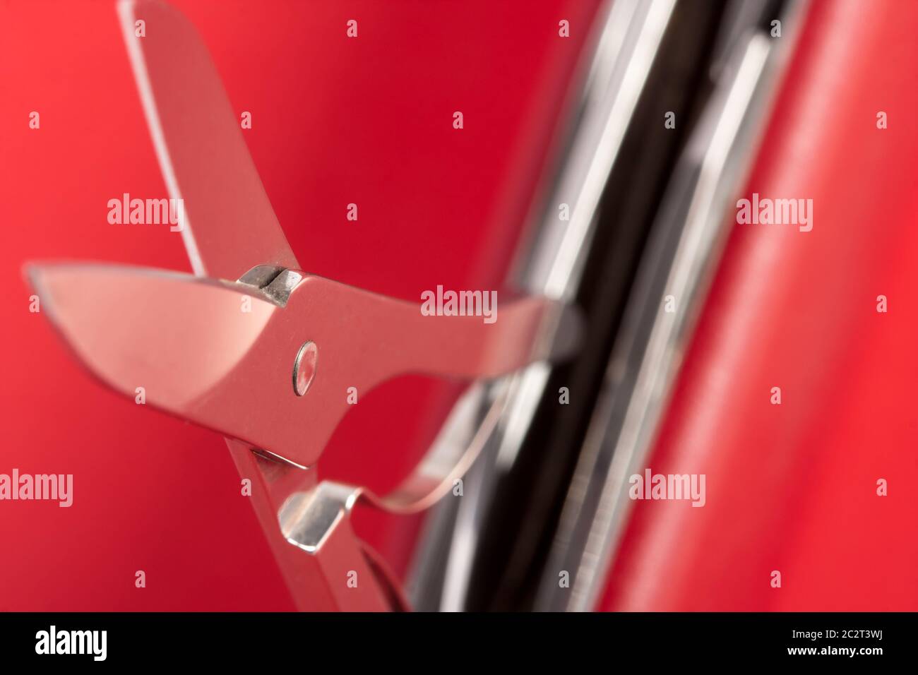 Red Swiss army knife with open scissors Stock Photo - Alamy