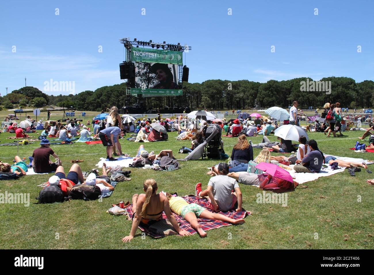 People sit and watch Tropfest Junior on the big screen earlier in the ...