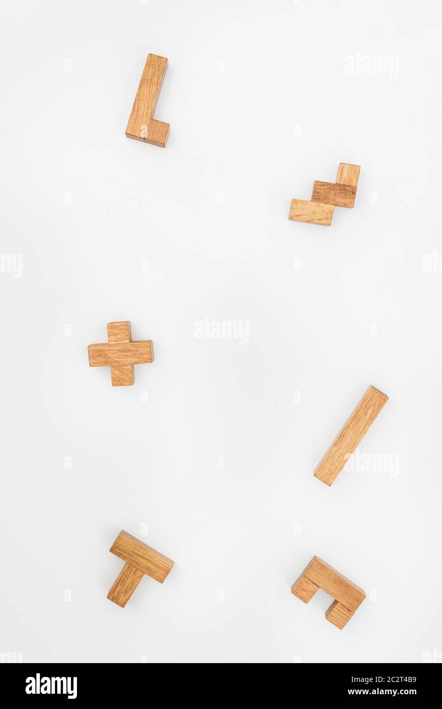 Wooden puzzle pieces as background Stock Photo - Alamy