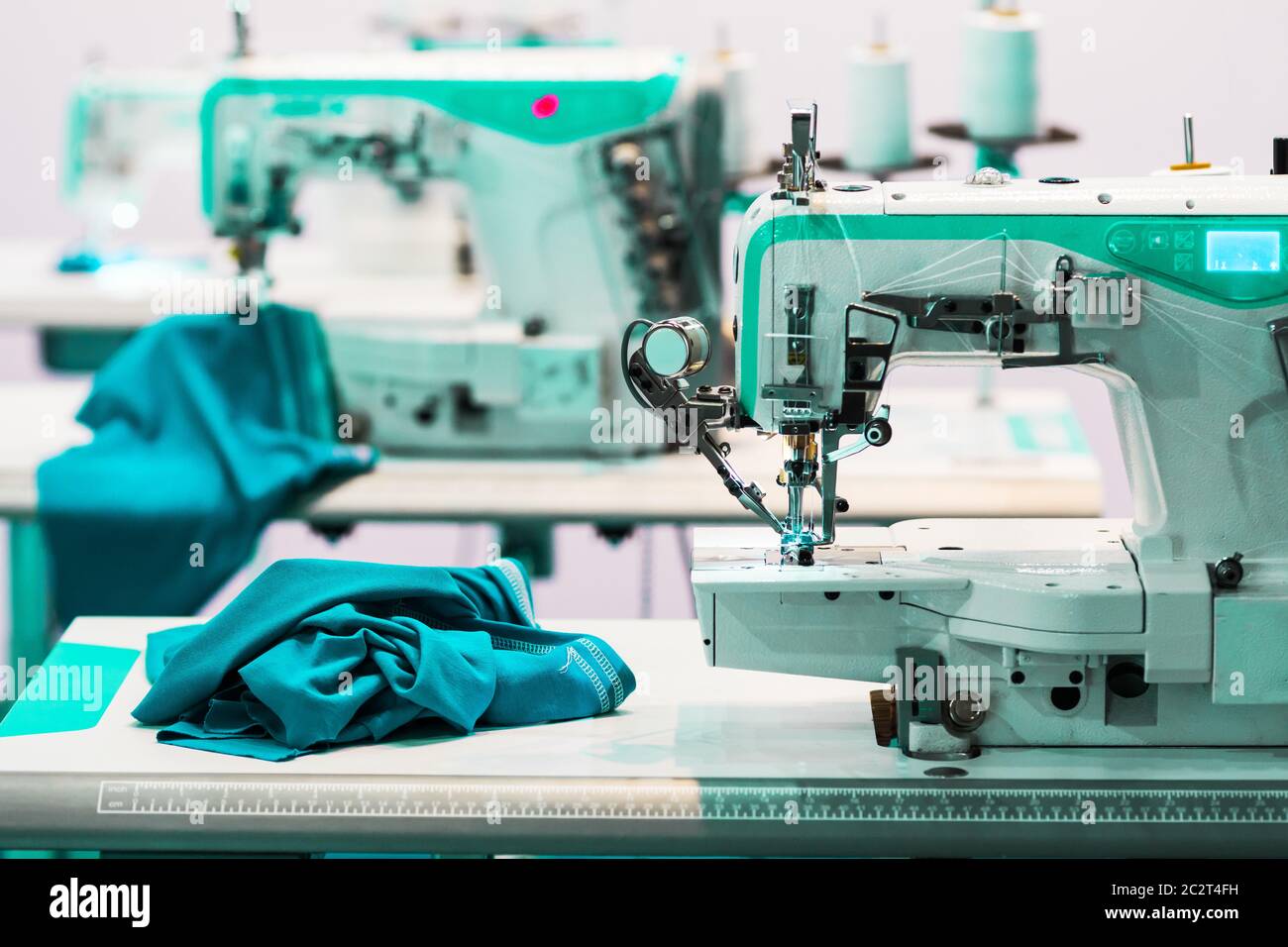 Sewing factory, nobody, overlock, stitching machines. Clothing sew ...