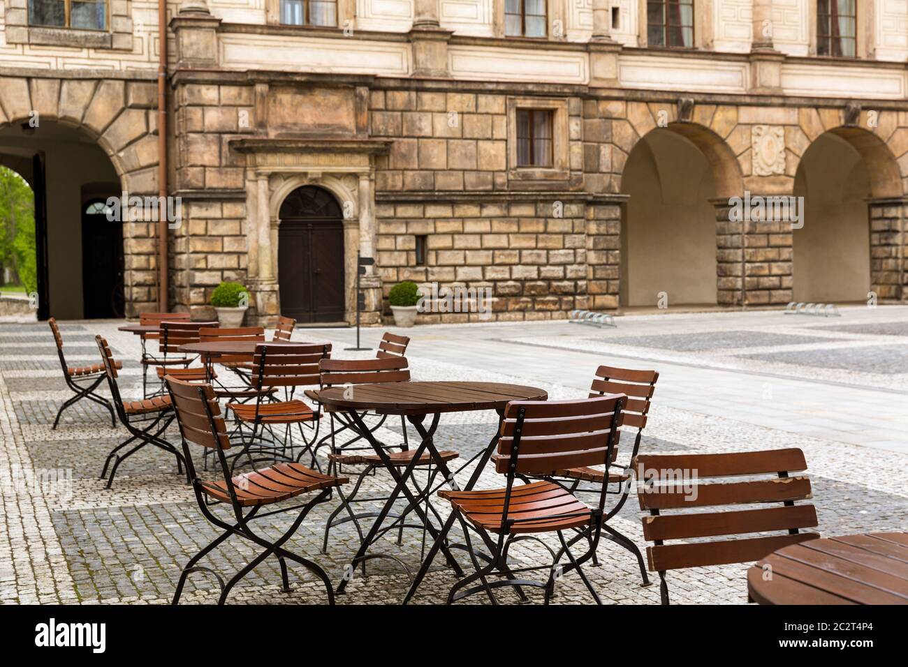 Ancient stone castle with coffee tables, Europe. Medieval european ...