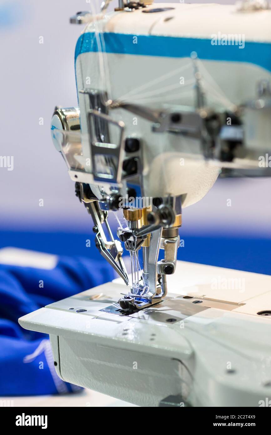 Sewing machine closeup, nobody, dressmaker equipment, cloth industry ...