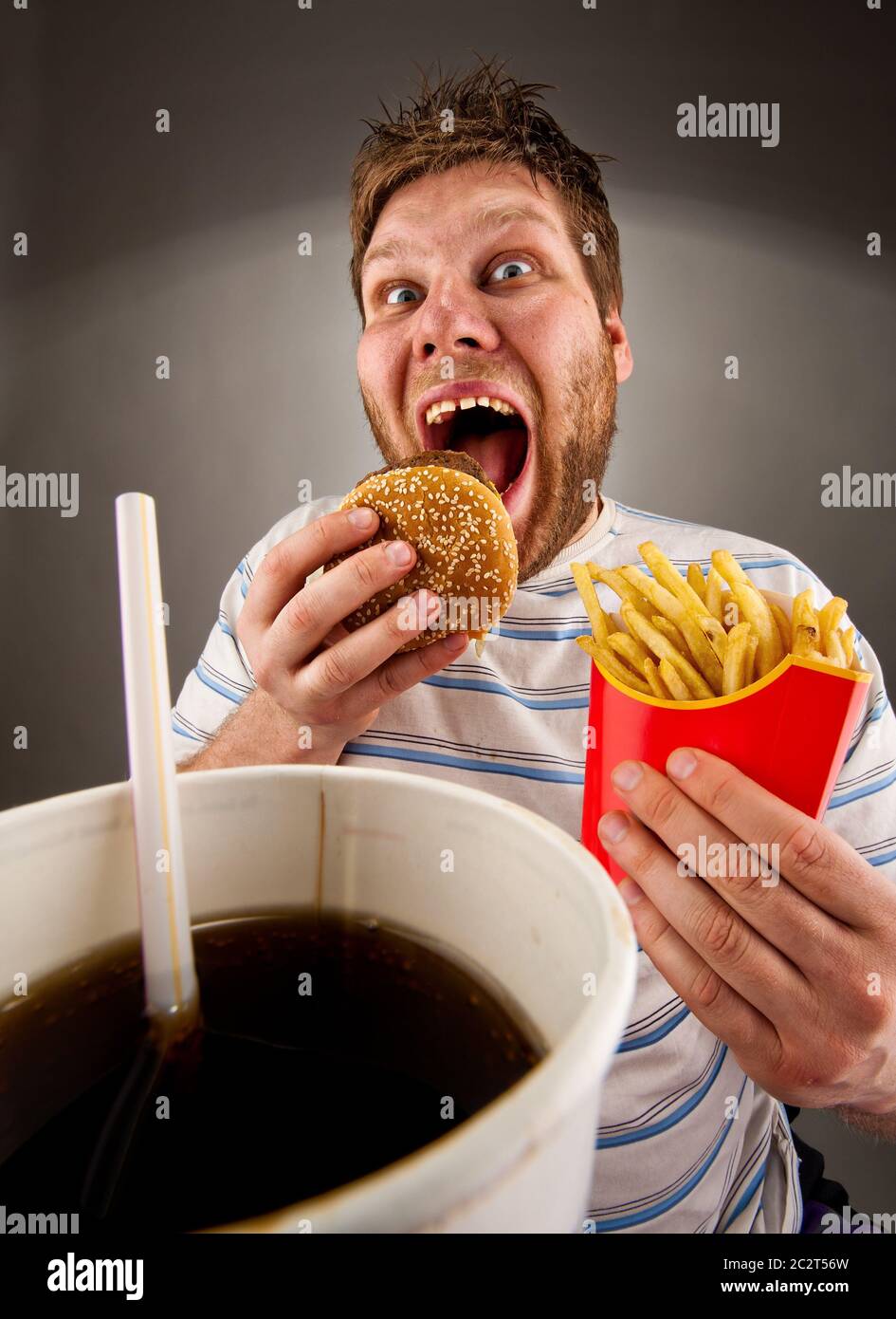 Fat men eating fast food hi-res stock photography and images - Alamy