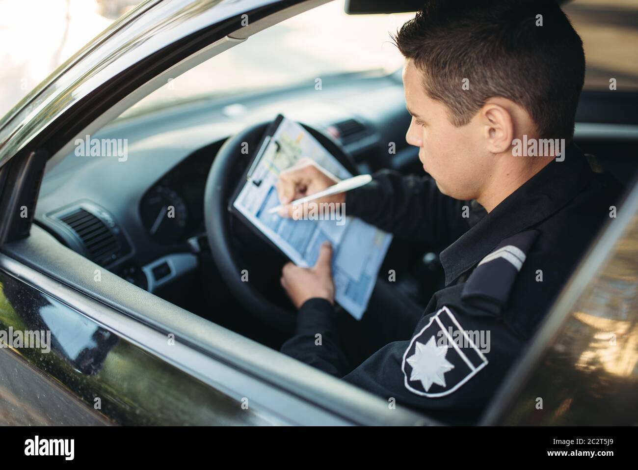 Sitting transportation crime arrest police officer hi-res stock ...