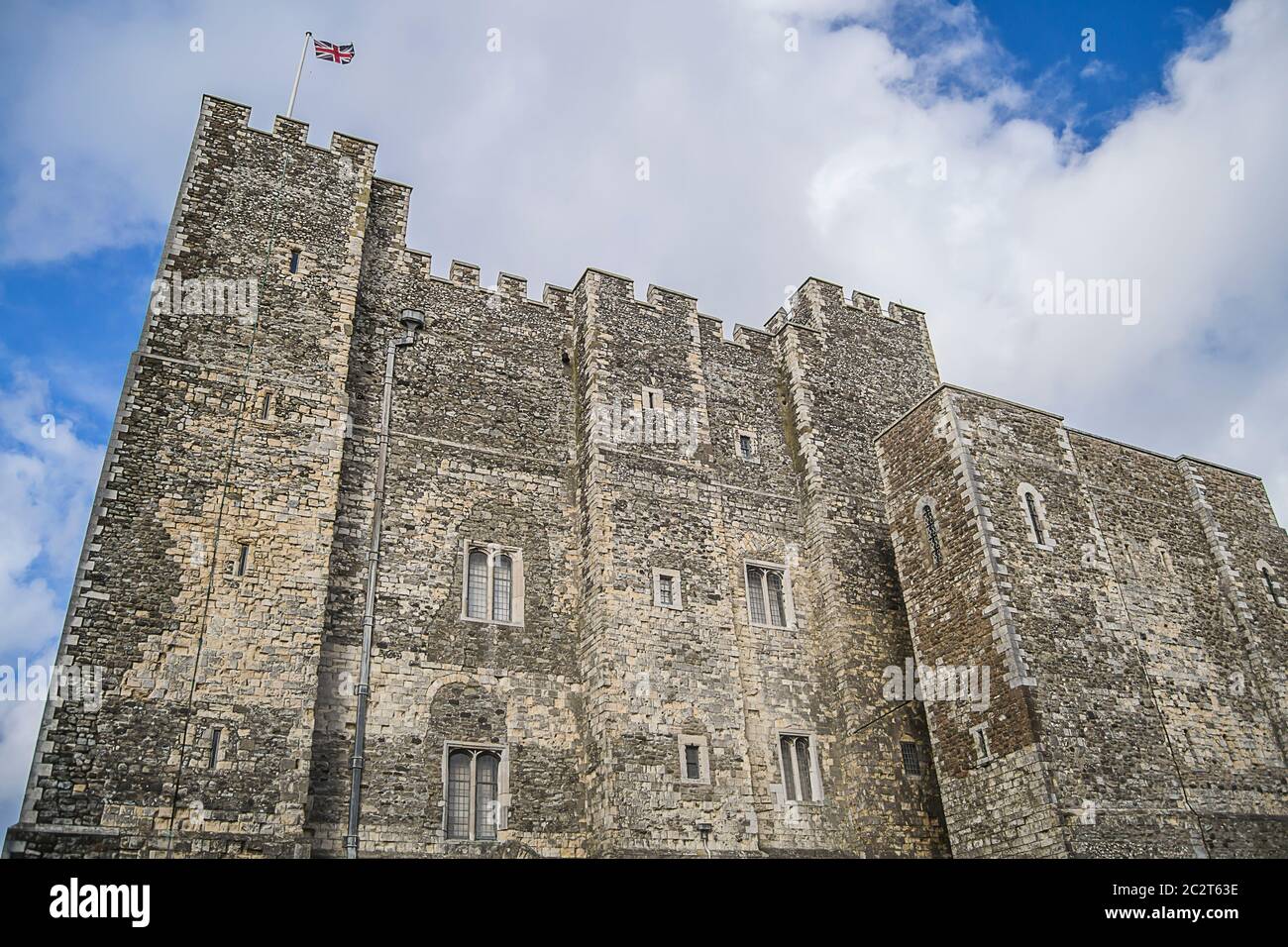 Dover castle with the British flag, England Stock Photo - Alamy