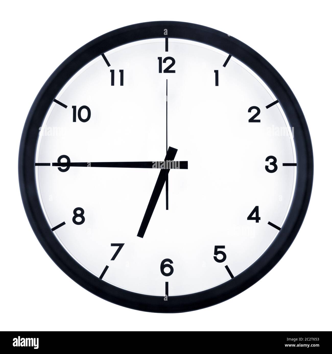Classic analog clock pointing at six forty five o'clock, isolated on ...