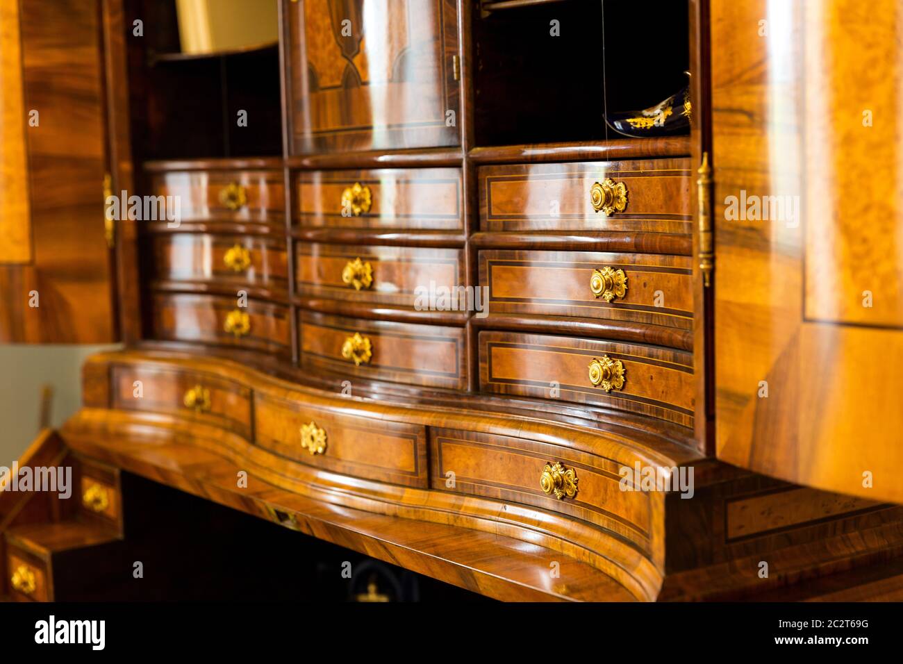 Ancient wooden dresser with many drawers in museum, Europe, nobody. Old ...