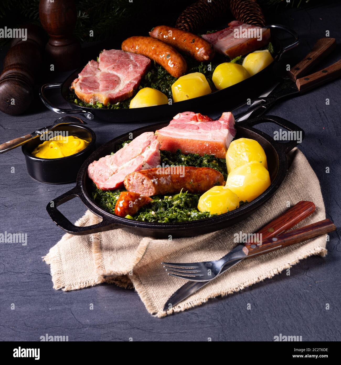 rustic kale with pinkel sausage and kassler Stock Photo - Alamy
