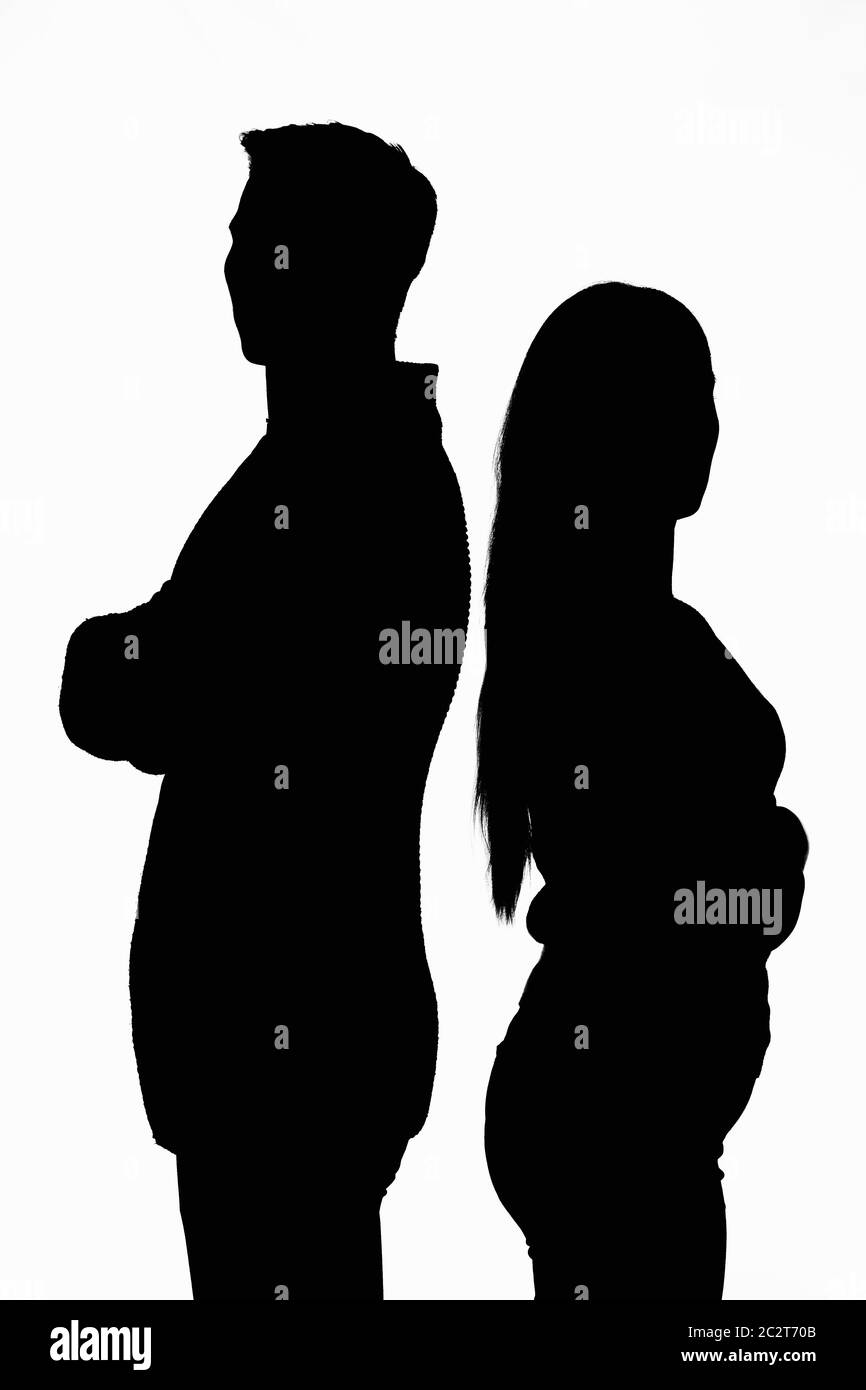 Dark images of two young men looked into the frame Stock Photo - Alamy
