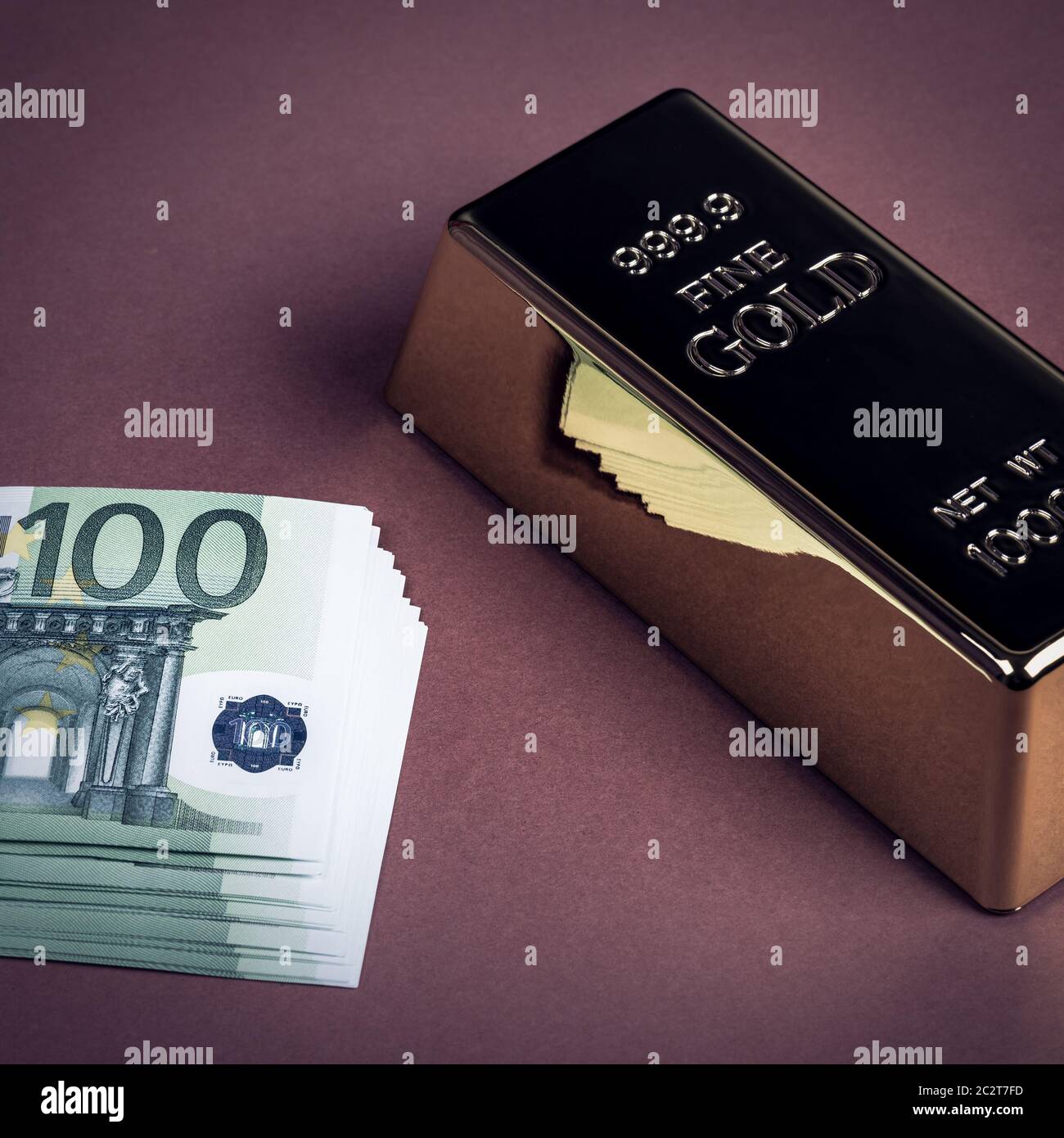 Euro cash and gold bar on a brown background. Banknotes. Money. Bill ...