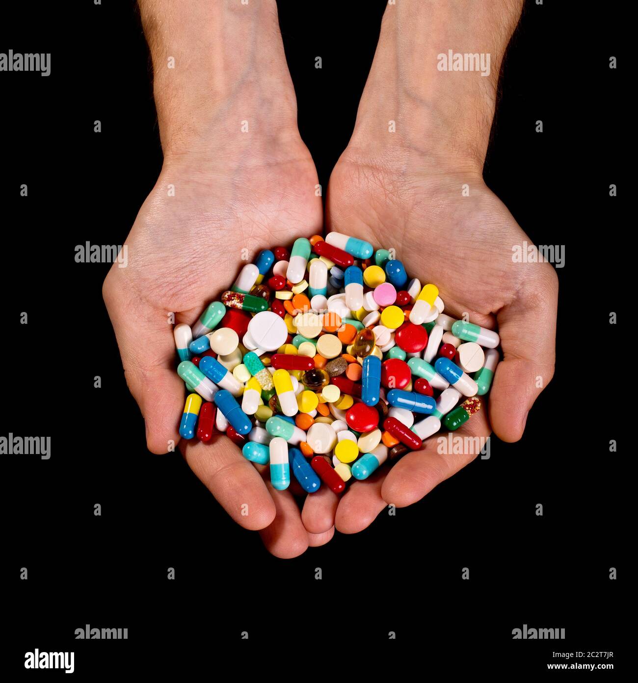 Hands full pills hi-res stock photography and images - Alamy