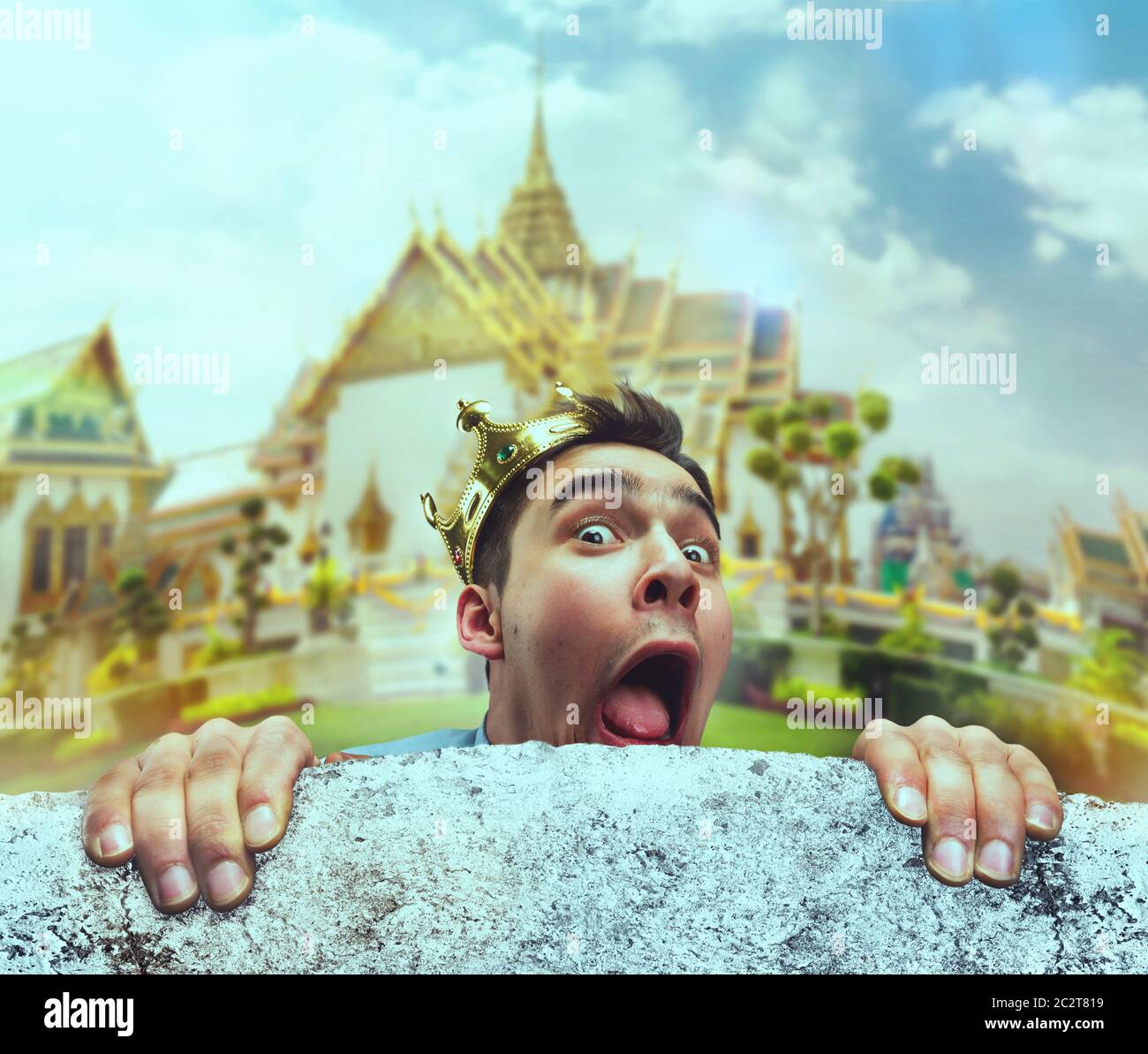 Portrait of a scared prince against asian temple Stock Photo - Alamy