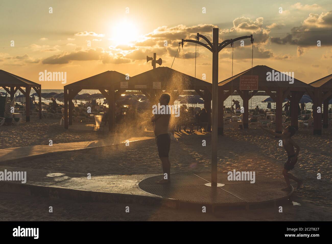 Tel Aviv/Israel-10/10/18: man is taking shower on the beach in Tel Aviv ...