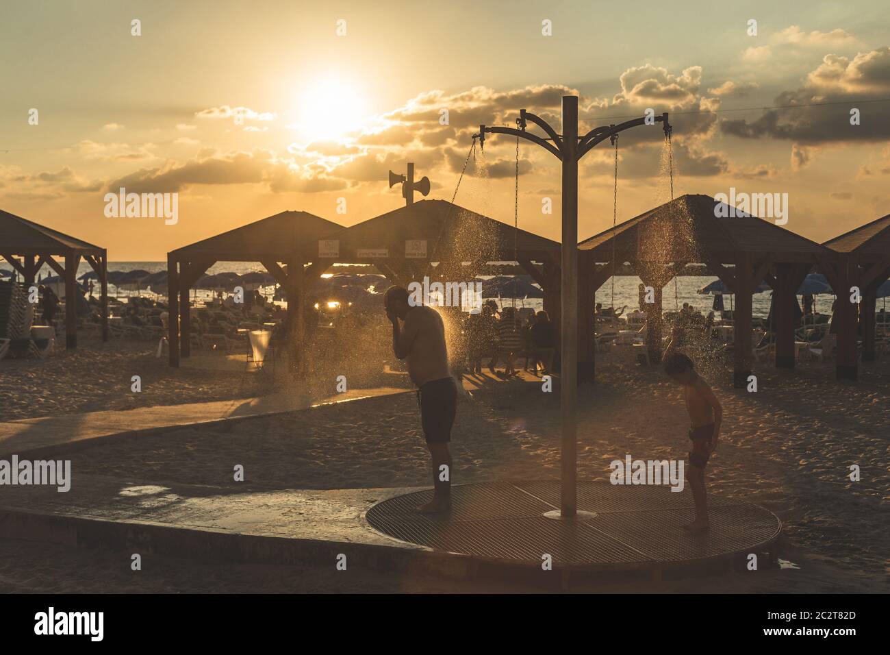 Tel Aviv/Israel-10/10/18: a man and a kid are taking shower on the ...