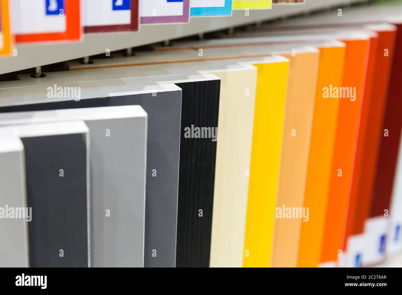 Set of many colorful wooden samples in a row Stock Photo - Alamy