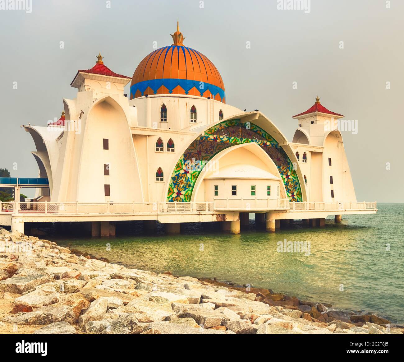 The Melaka Straits Mosque on water at sunset Stock Photo - Alamy