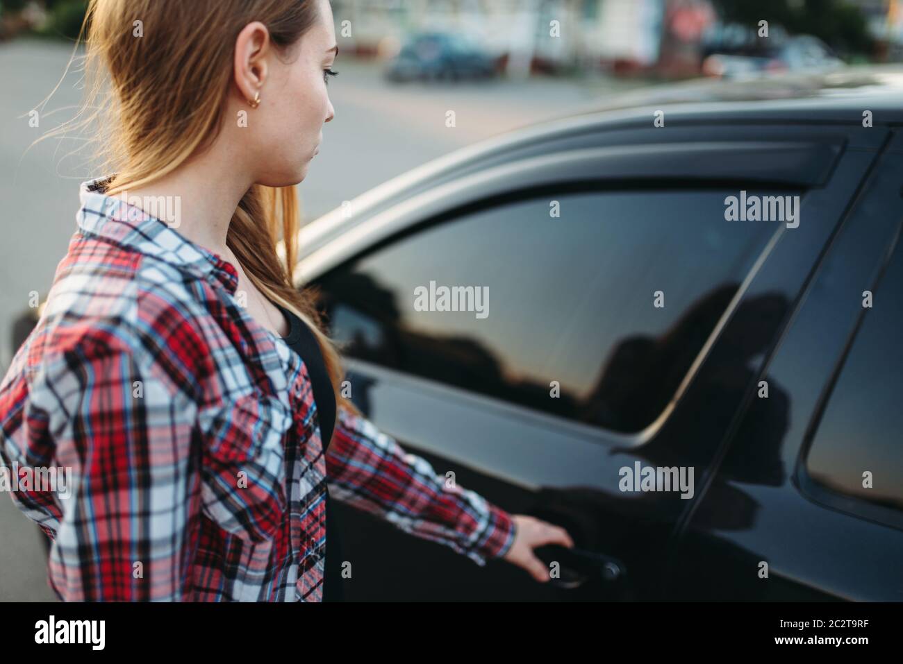 Female hand open car door, driver beginner concept. Woman at the ...