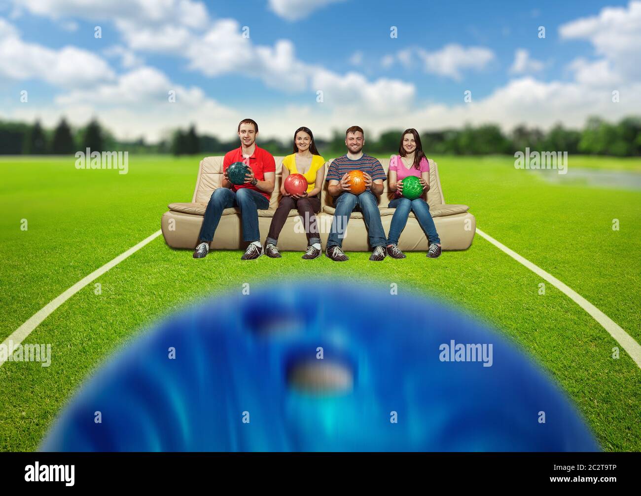 Bowling team sitting on the sofa on the lawn Stock Photo - Alamy