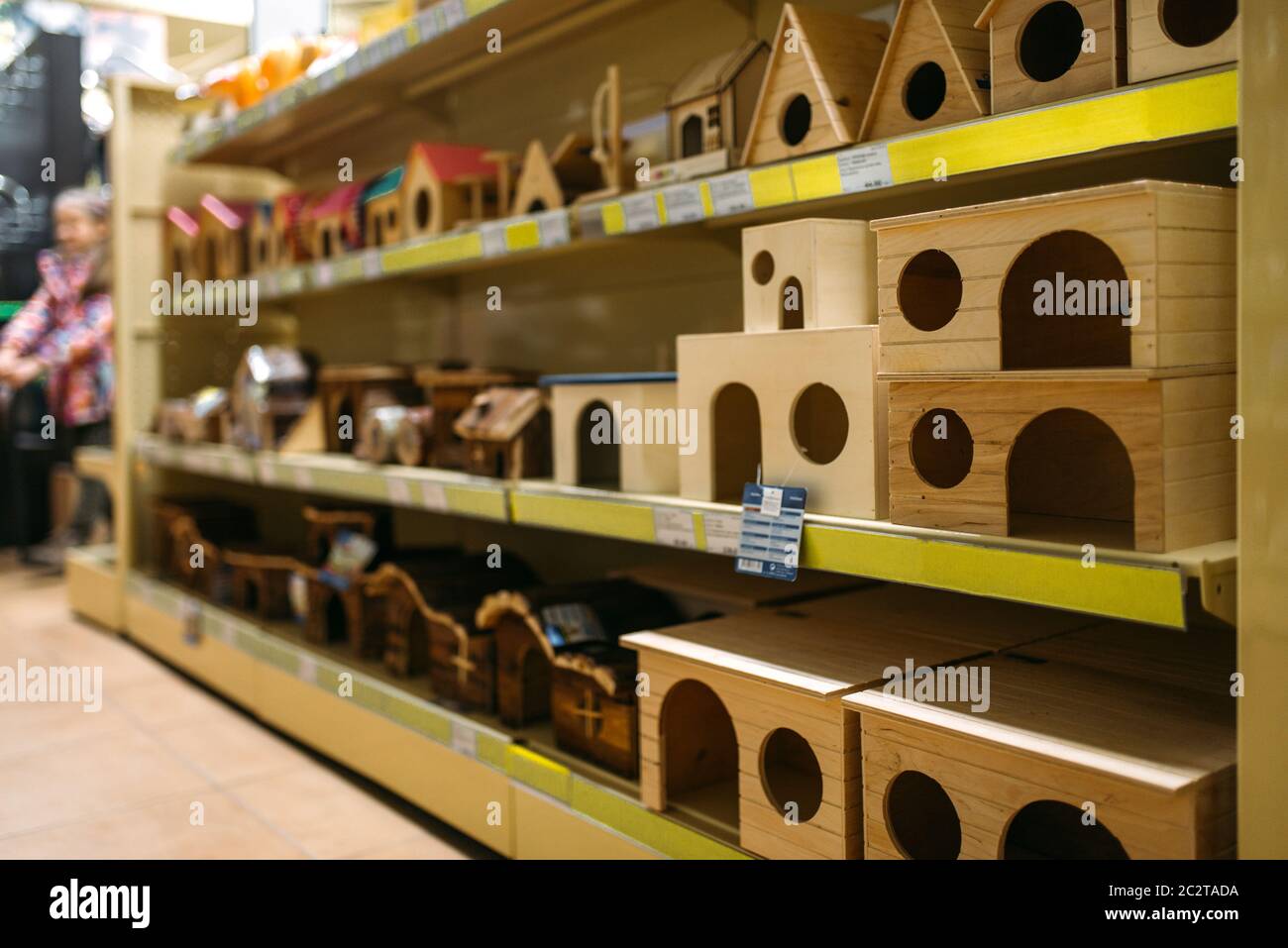 Inside pet store, shelves with accessories, market for domestic animals ...