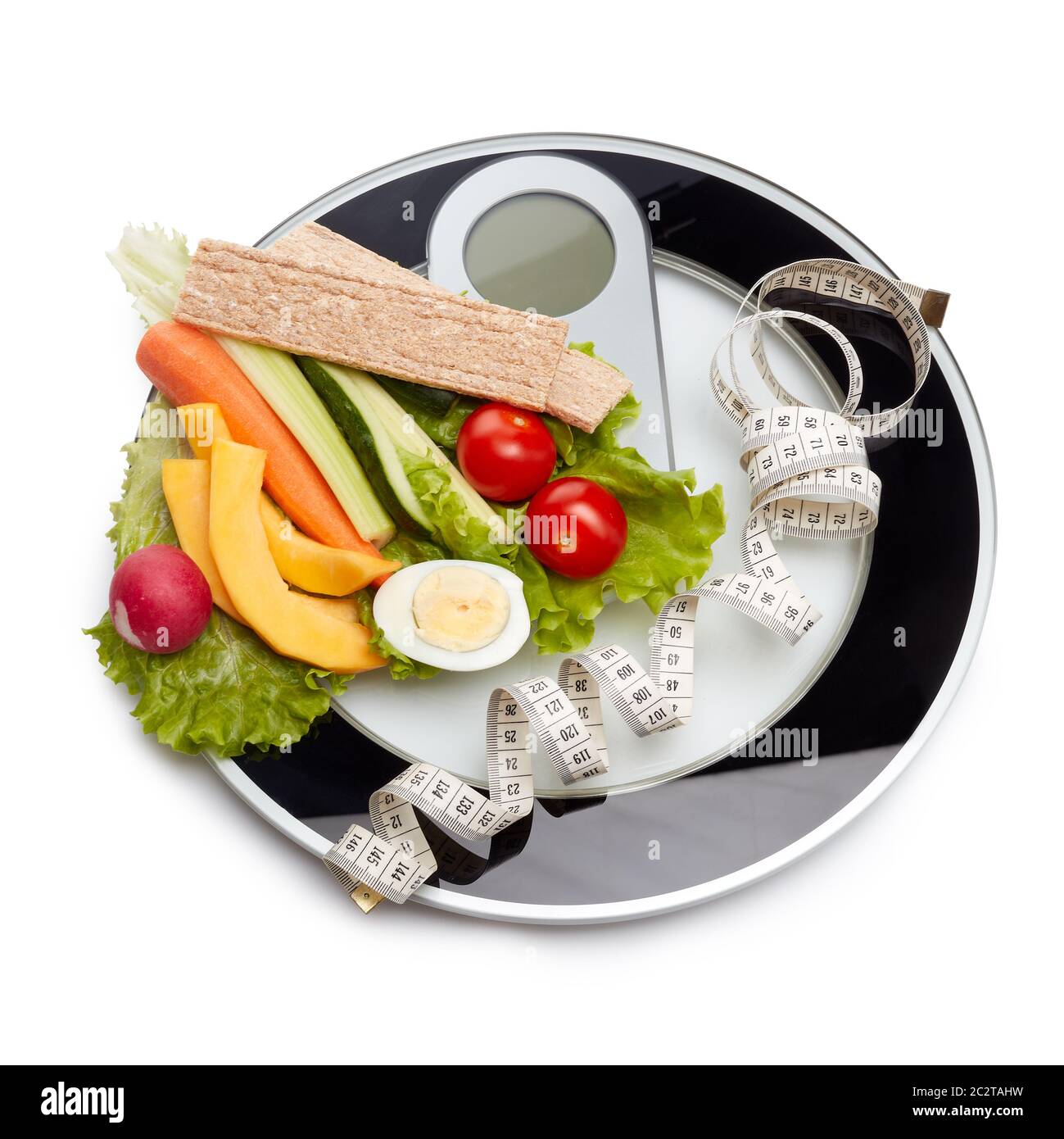 Still life with healthy food, scales and measuring tape on white ...