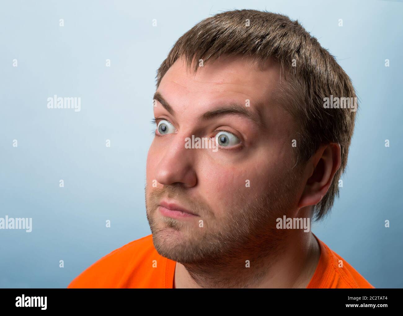 Person wearing orange shirt hi-res stock photography and images - Alamy