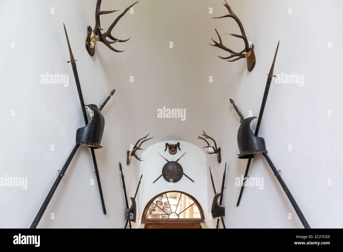 The hall of trophies, exhibits on the wall, Europe. Medieval european ...