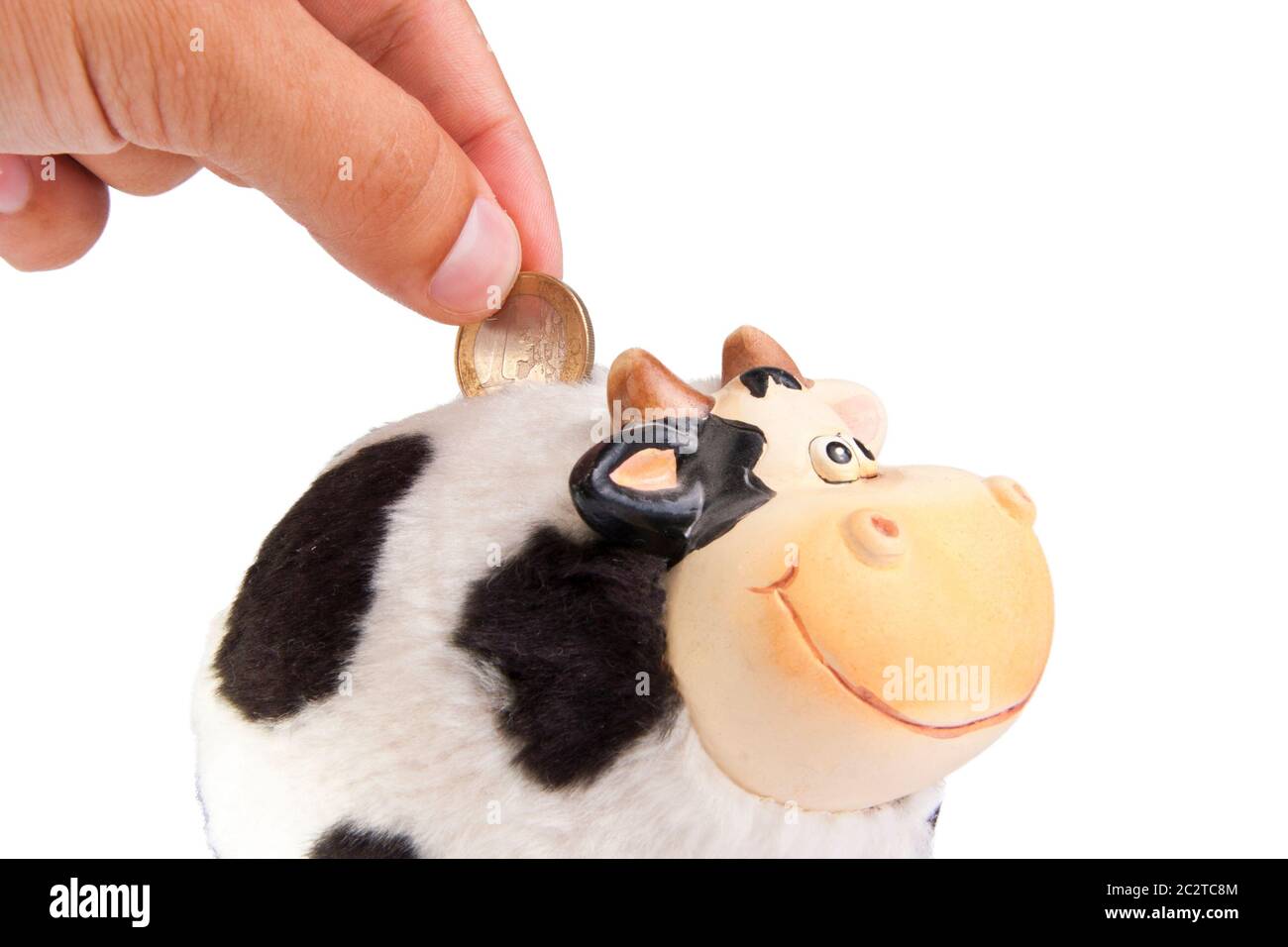 Cow moneybox isolated on white Stock Photo - Alamy