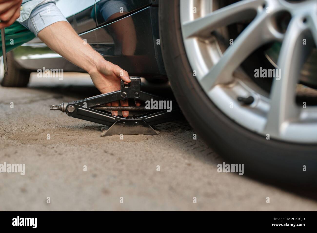 Punctured car on highway hi-res stock photography and images - Alamy