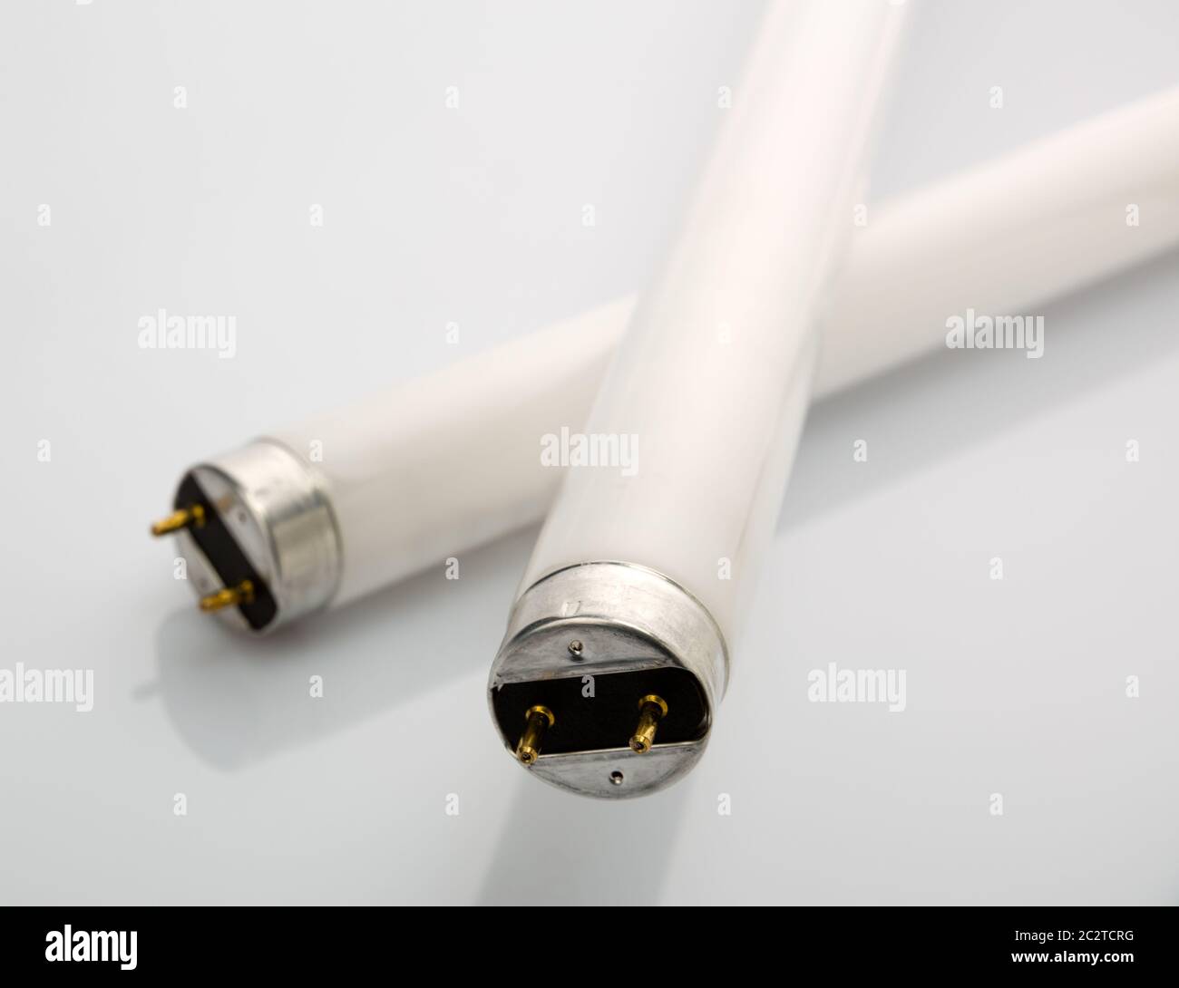 Two fluorescent lamp on white Stock Photo - Alamy
