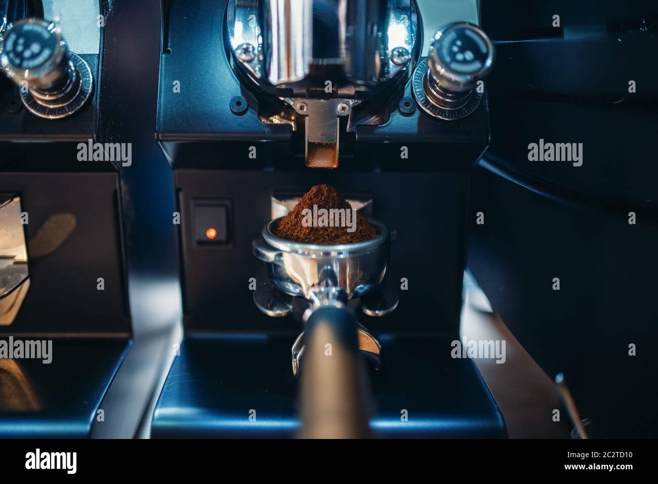 Coffee machine with fresh ground grains closeup, nobody. Professional ...