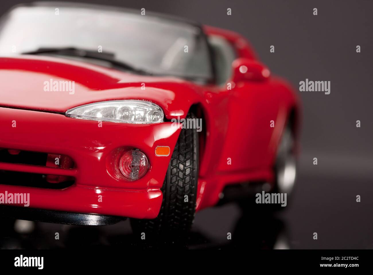 Close-up of a red toy sport car Stock Photo - Alamy