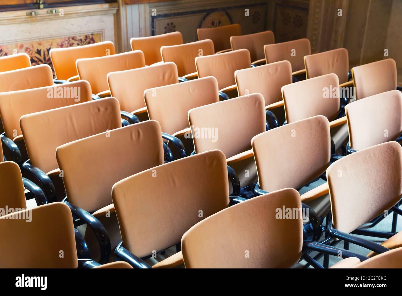 Close up of seats standing in rows in the hall Stock Photo - Alamy