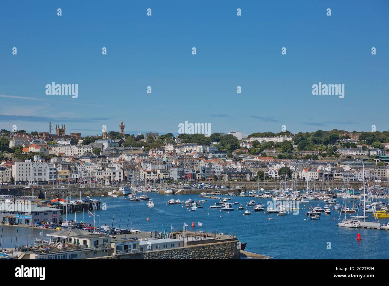 Scenic view of a bay in St. Peter Port in Guernsey, Channel Islands, UK ...