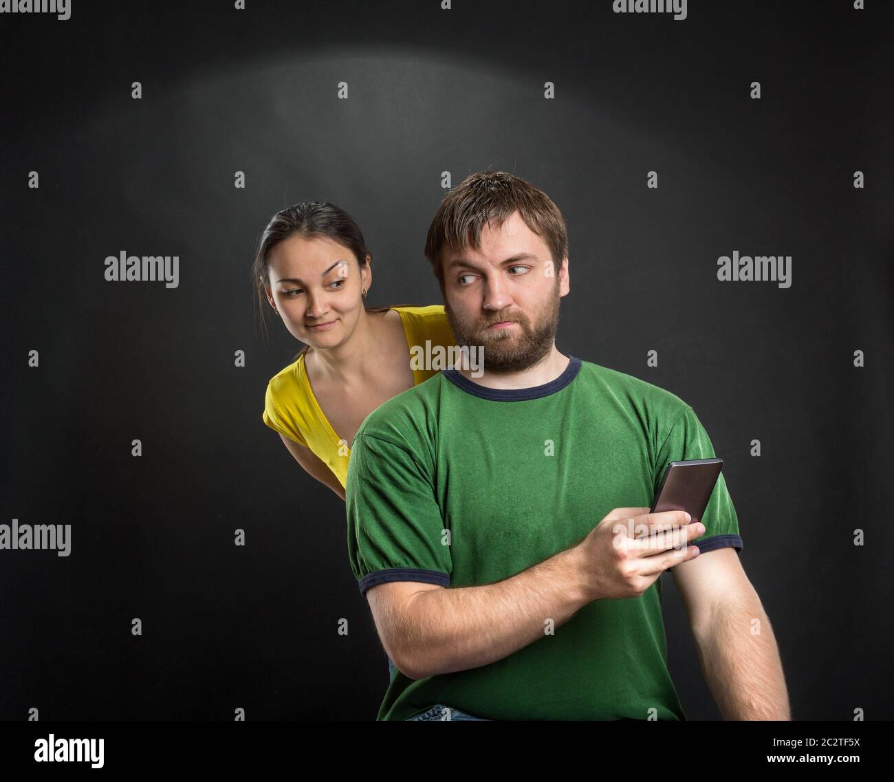 Surprised man looking over shoulder hi-res stock photography and images ...