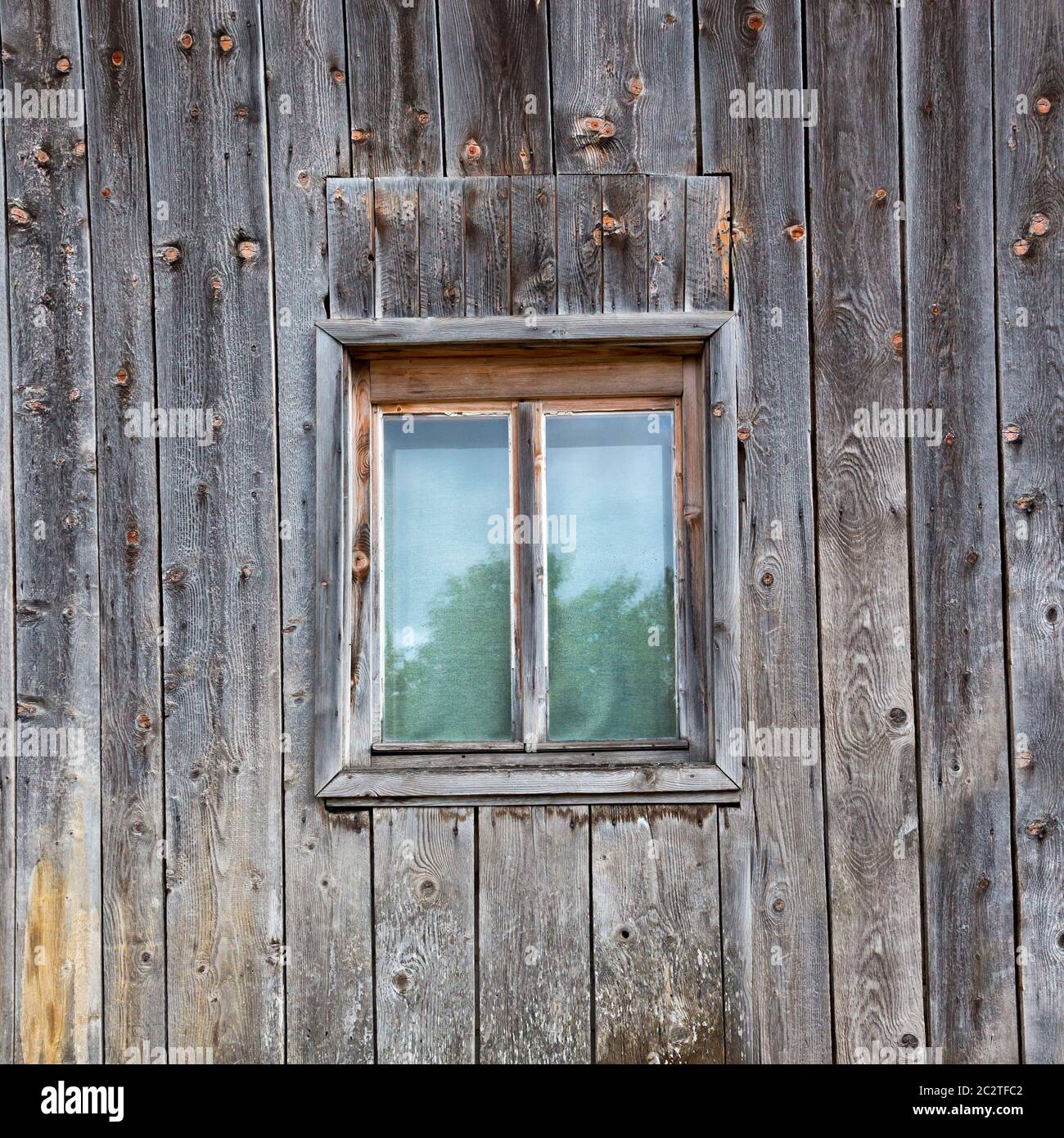 Old window on wooden house Stock Photo - Alamy