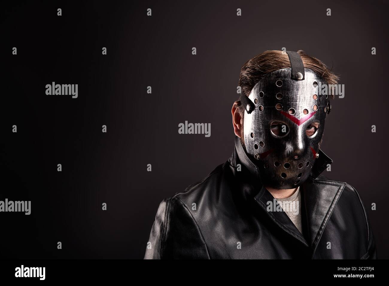 Bloody murderer in hockey mask portrait on dark background Stock Photo ...