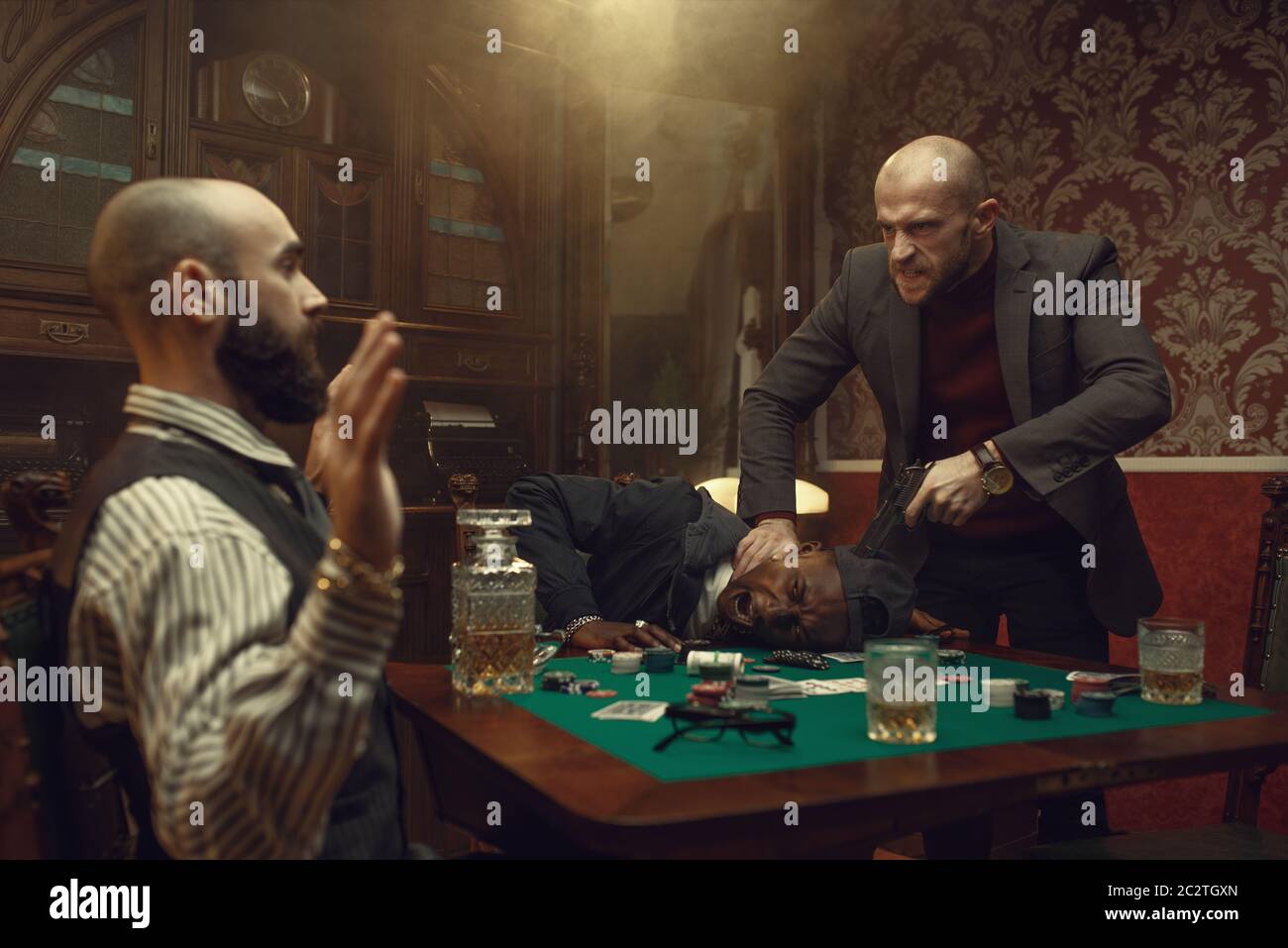 Man gun poker table in hi-res stock photography and images - Alamy
