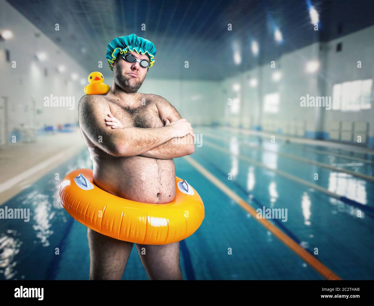 Adult odd man having fun in the pool Stock Photo - Alamy