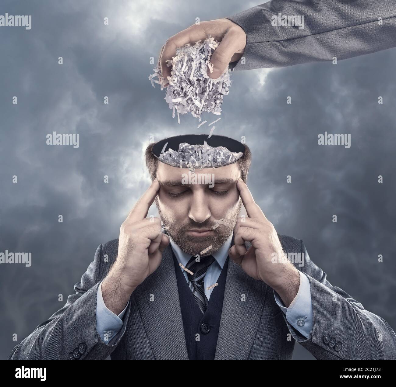 Man with shredded paper in his brain Stock Photo - Alamy