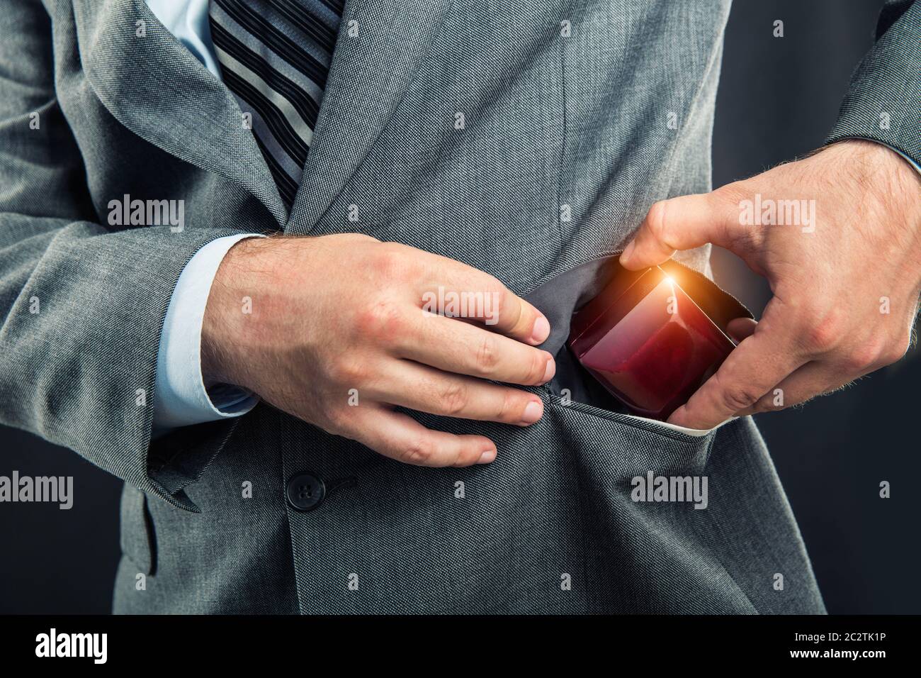 Businessman putting gift box hi-res stock photography and images - Alamy