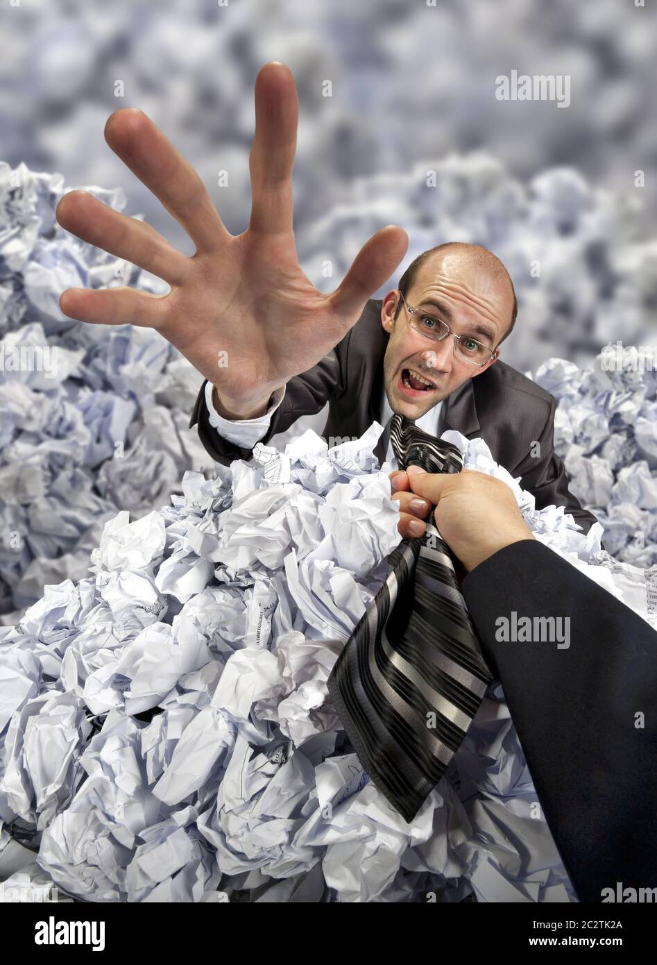 Businessman buried in paperwork hi-res stock photography and images - Alamy