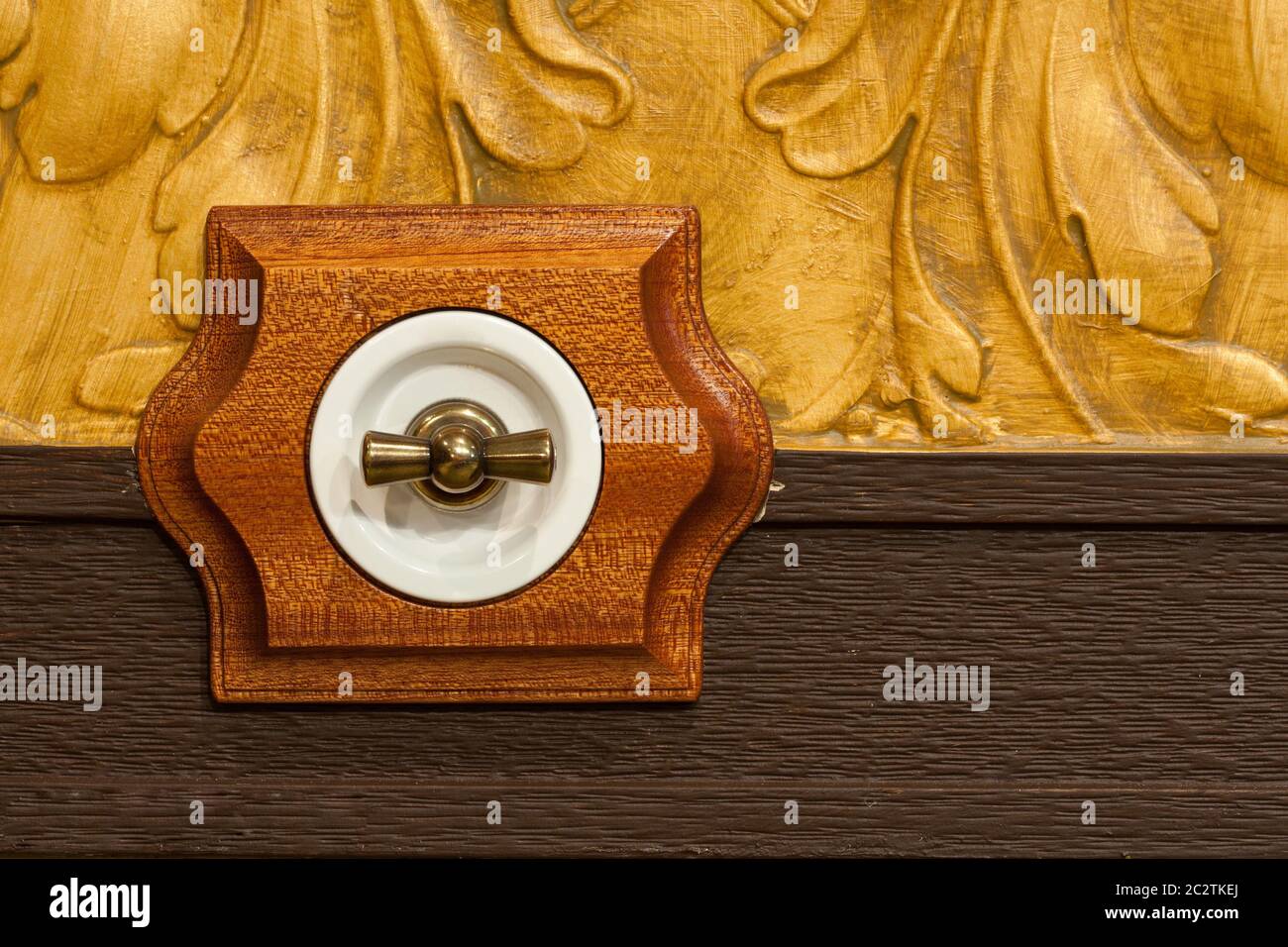 Antique wooden light switch on the wall Stock Photo - Alamy