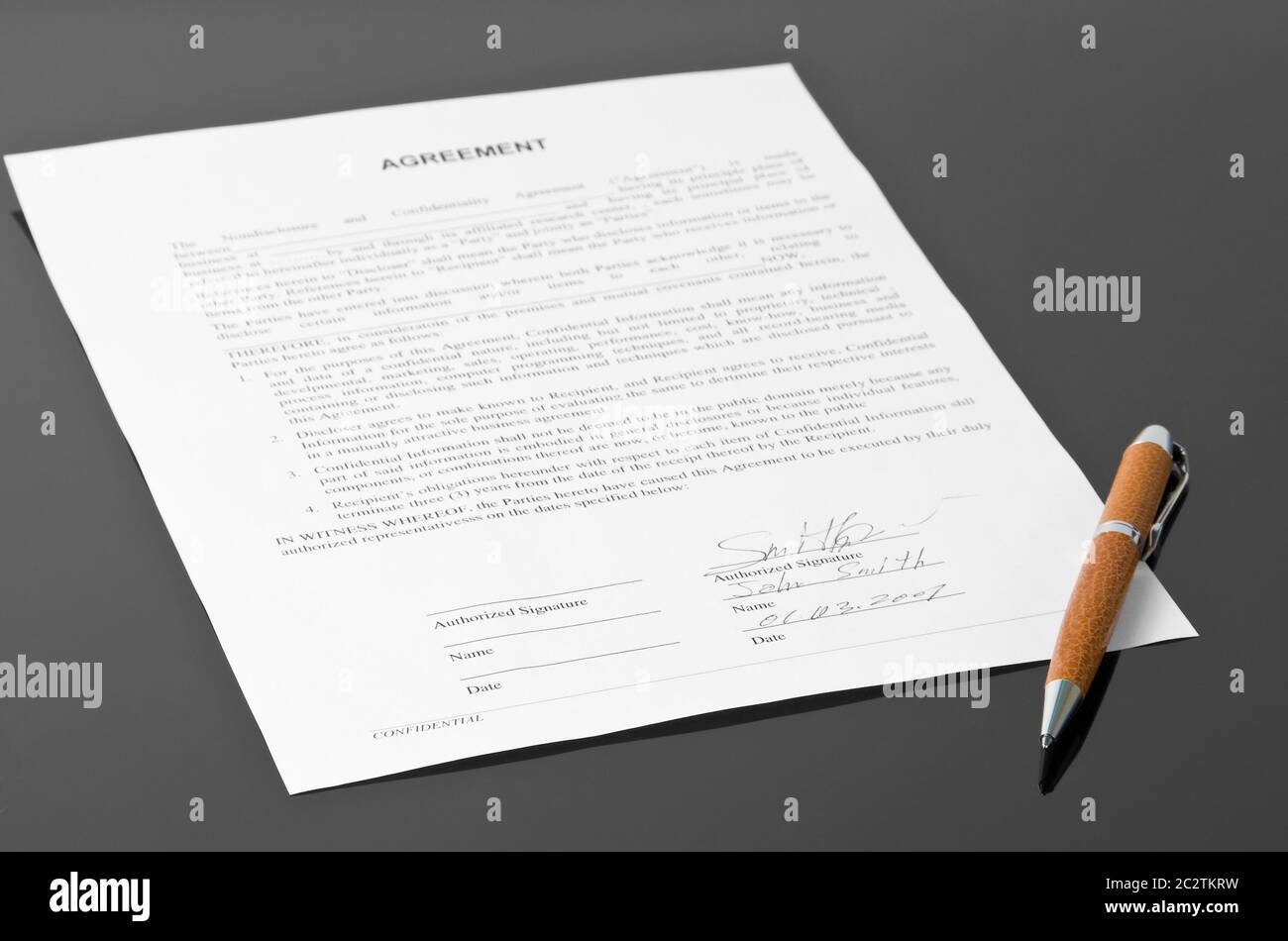 Signed agreement hi-res stock photography and images - Alamy