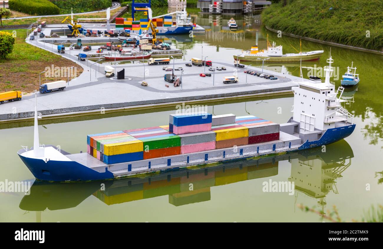 Cargo ship in port, miniature scene outdoor, europe. Mini figures with ...