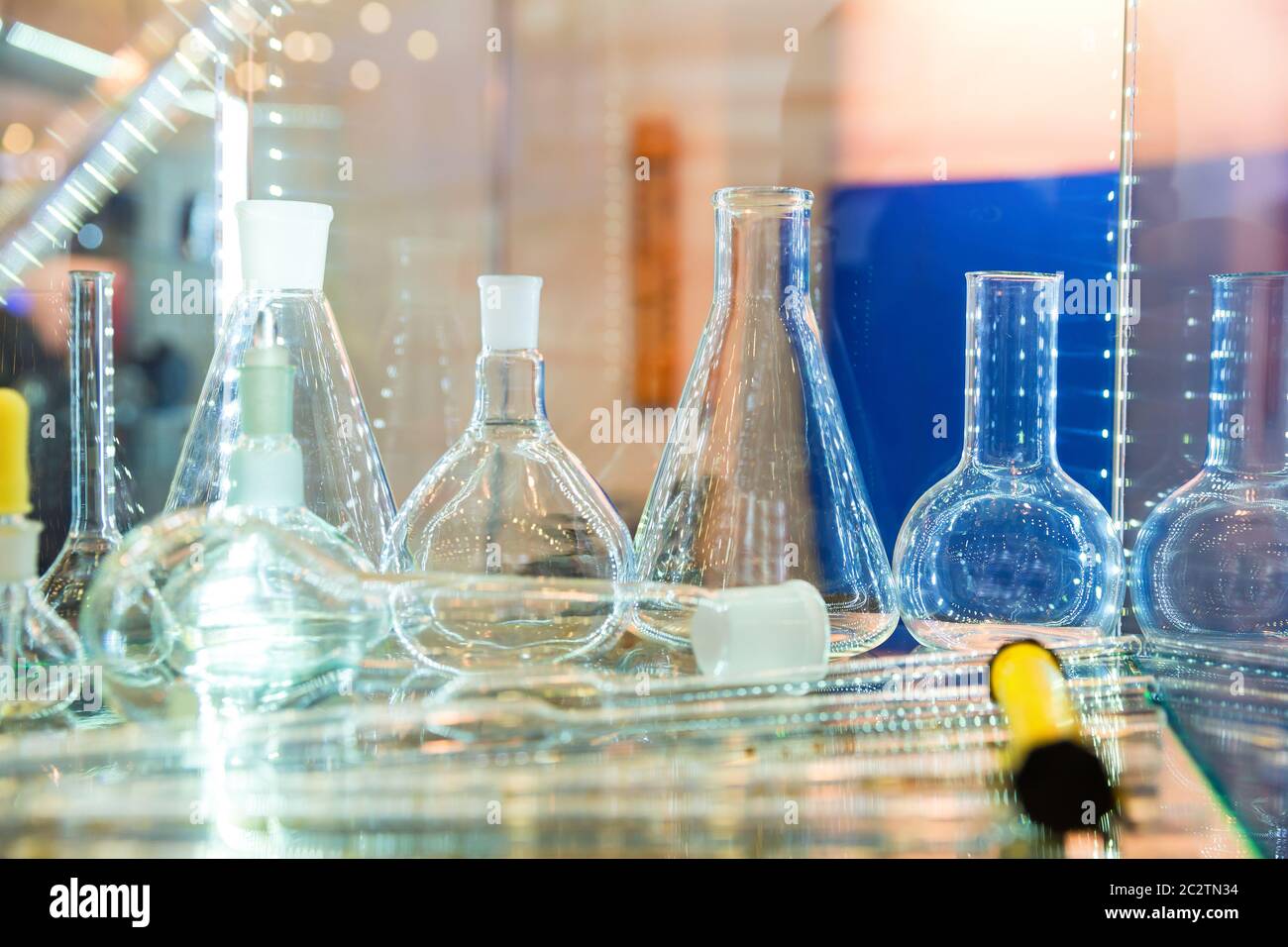 Different laboratory flasks and test tubes on the table Stock Photo - Alamy